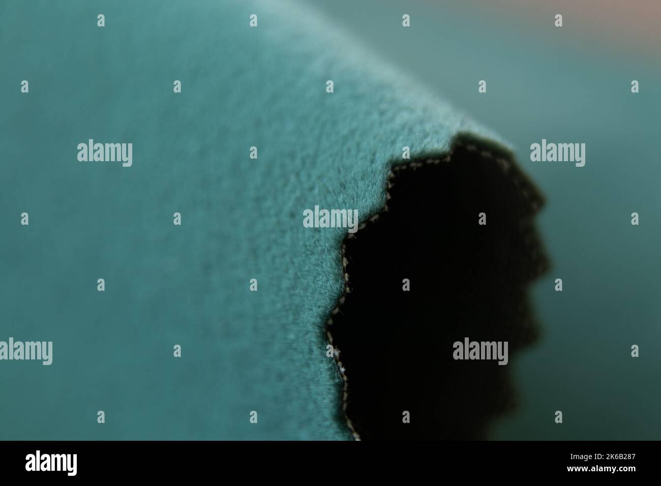 Green fabric as a background, velor soft fabric, green wrinkled fabric ...