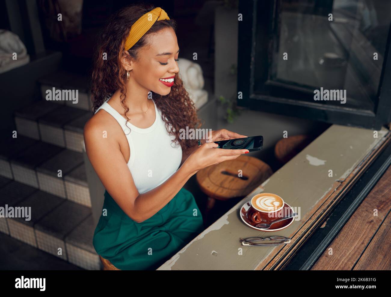 Phone, cafe and girl taking photograph of coffee to post on social ...