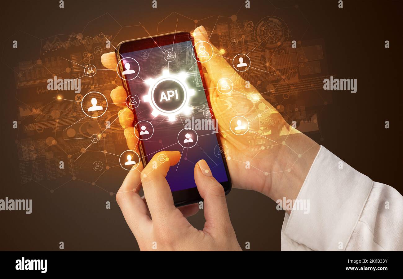 Hand using smartphone with technology concept Stock Photo - Alamy