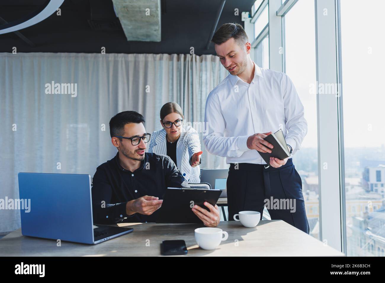 Caucasian male CEO businessman leader with team of diverse colleagues ...