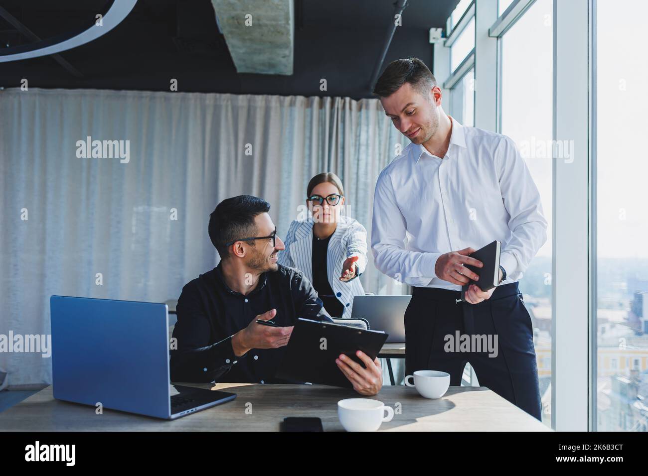 Caucasian male CEO businessman leader with team of diverse colleagues ...