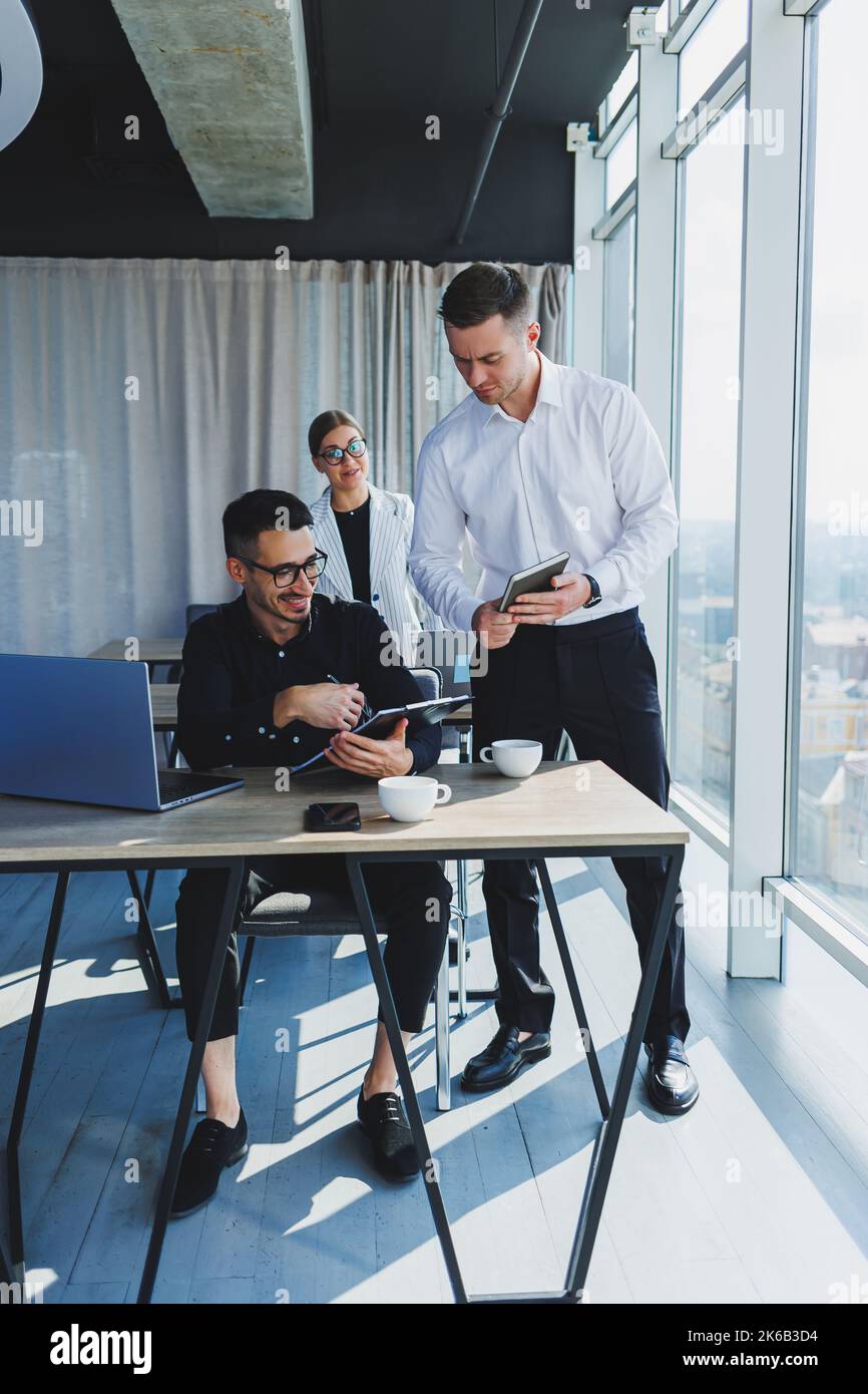 Caucasian male CEO businessman leader with team of diverse colleagues ...