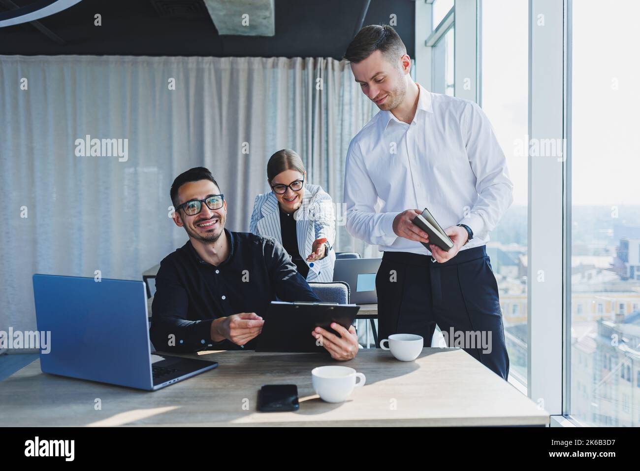 Caucasian male CEO businessman leader with team of diverse colleagues ...