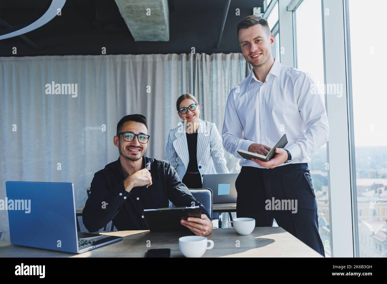 Caucasian male CEO businessman leader with team of diverse colleagues ...