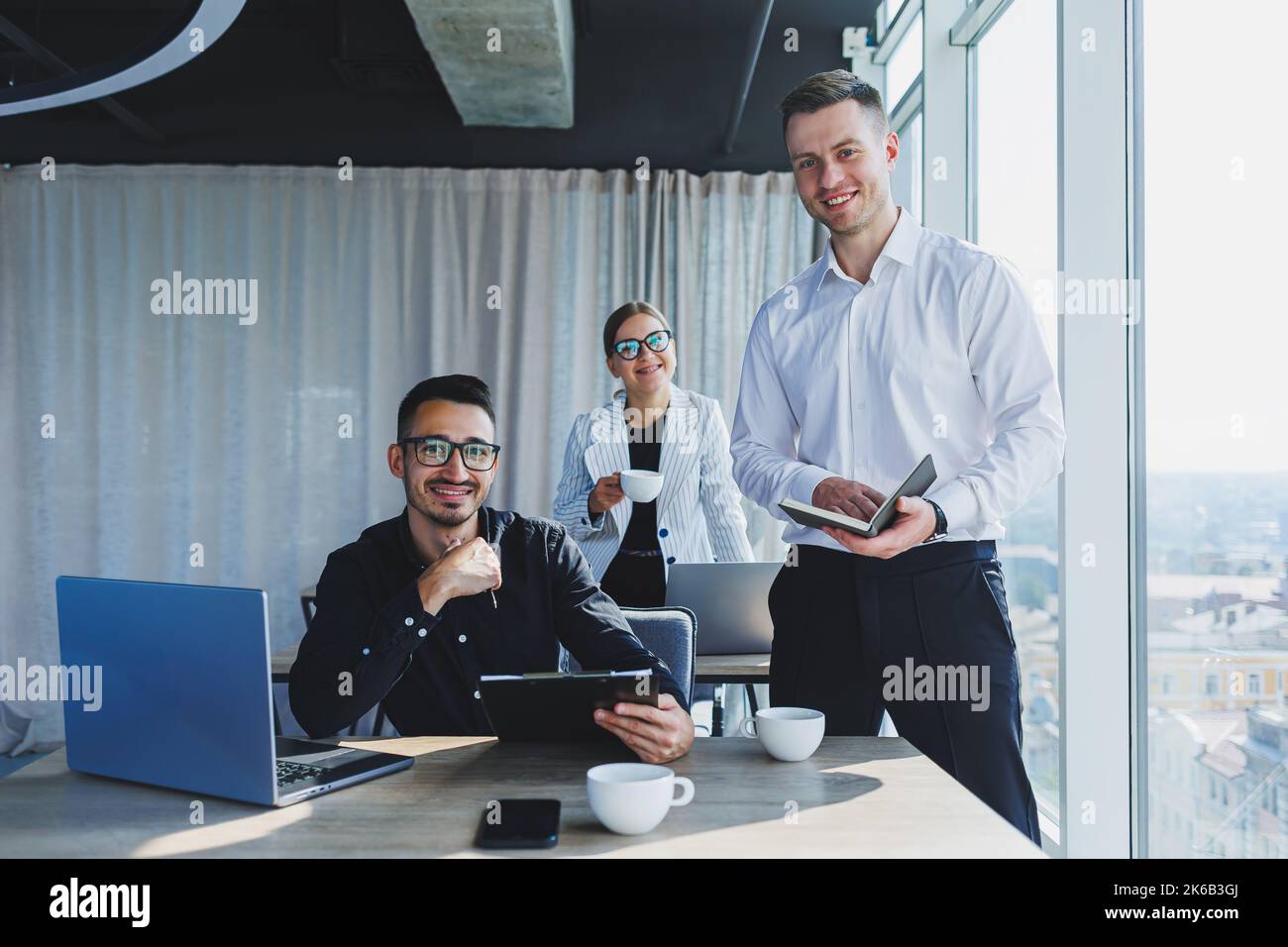 Caucasian male CEO businessman leader with team of diverse colleagues ...