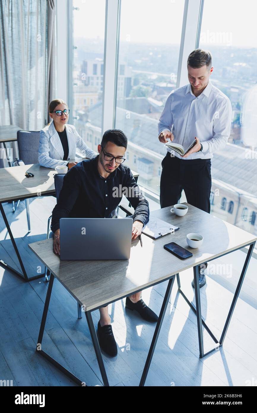 Caucasian male CEO businessman leader with team of diverse colleagues ...