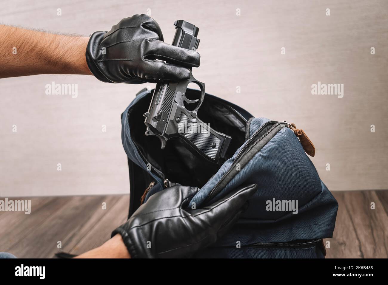 Handgun in evidence bag hi-res stock photography and images - Alamy