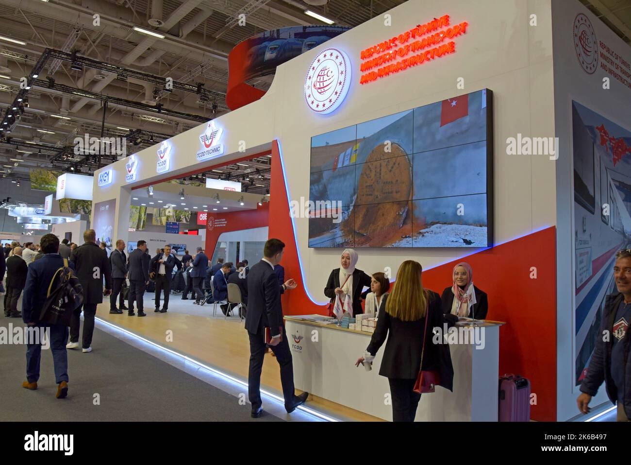 Visitors and railway engineers being welcomed at the Turkish Railways stand at Innotrans ...
