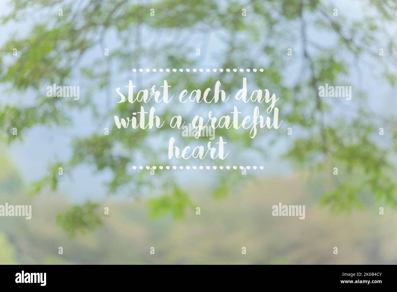 Inspirational quote with phrase: start each day with grateful heart ...