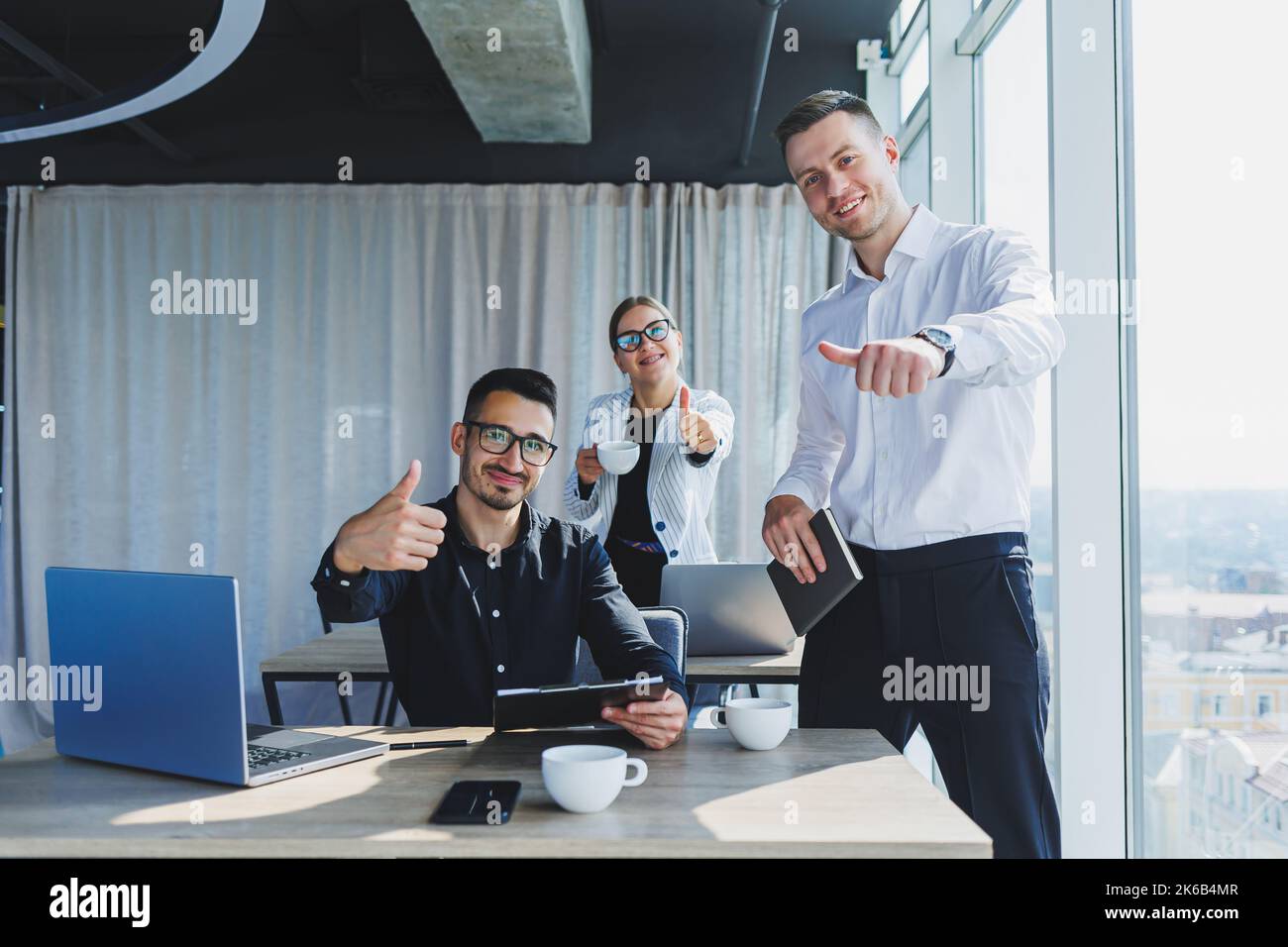 Caucasian male CEO businessman leader with team of diverse colleagues ...