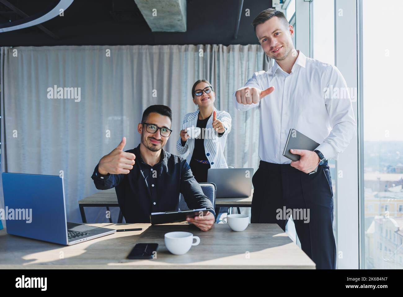 Caucasian male CEO businessman leader with team of diverse colleagues ...