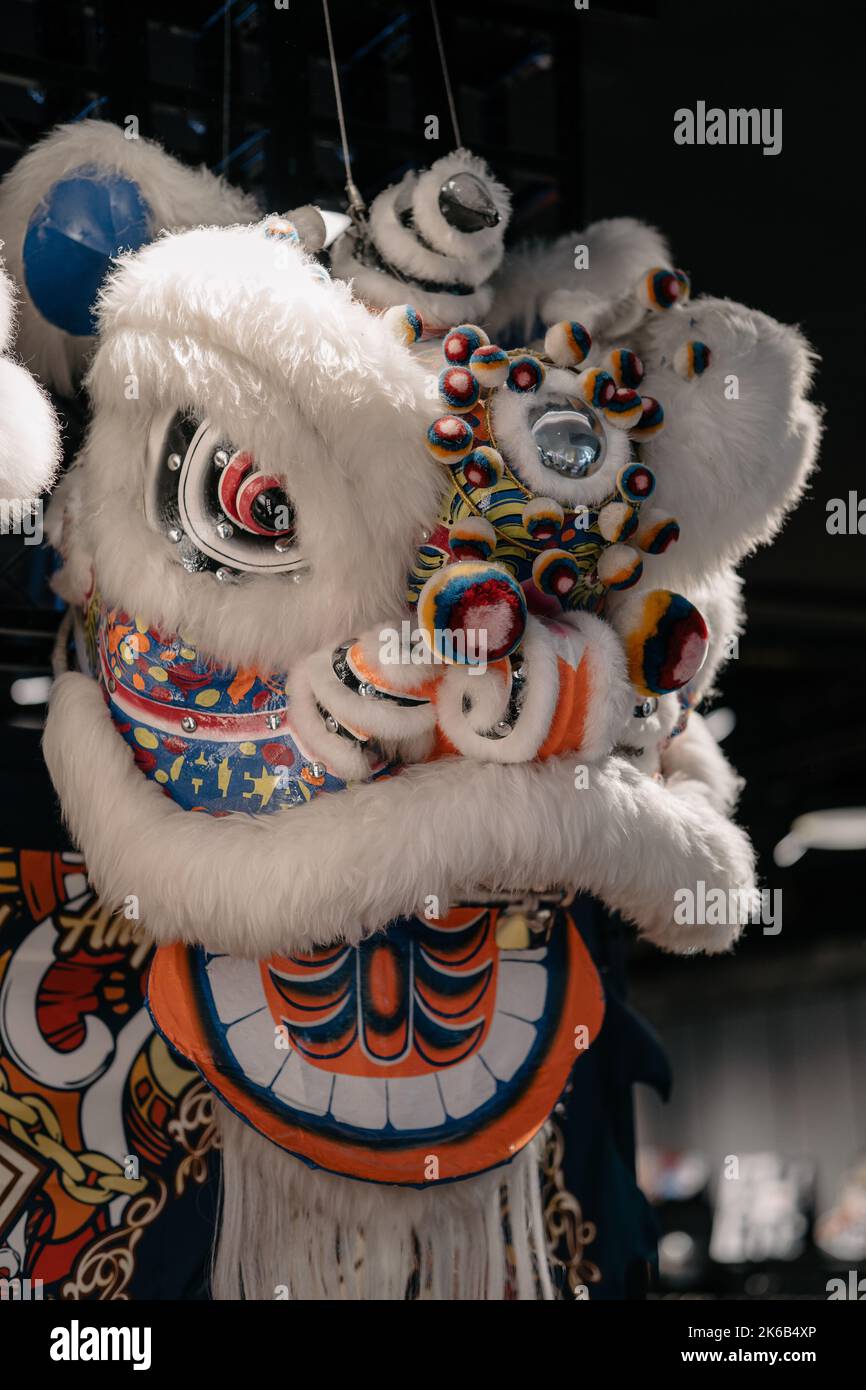 A vertical of a Chinese lion puppet Stock Photo - Alamy