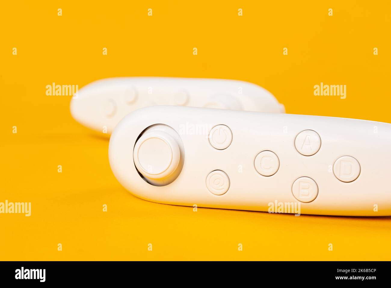 Gaming concept. Joystick on color background Stock Photo - Alamy