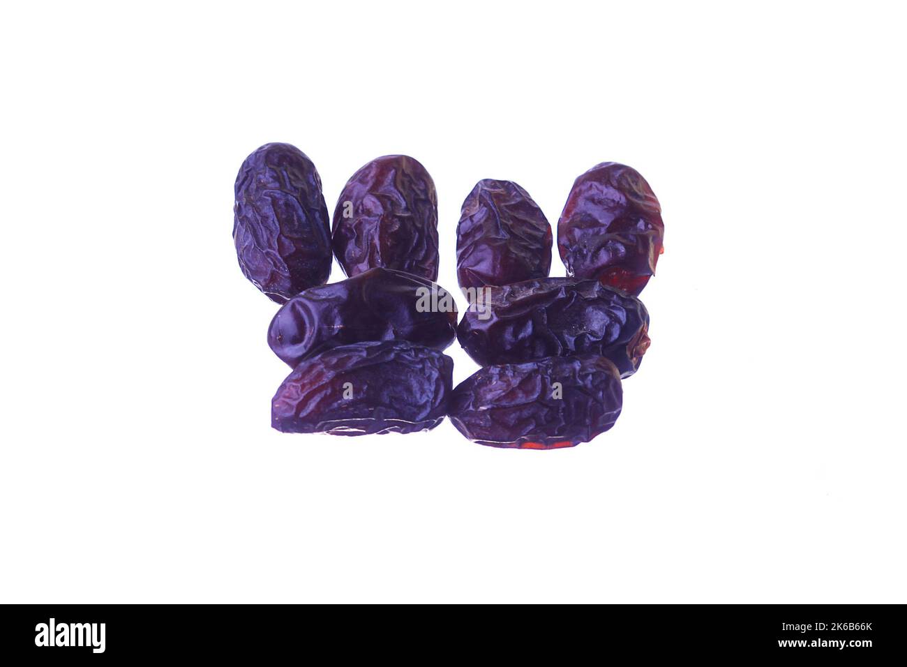 Dried dates isolated on white background Stock Photo - Alamy