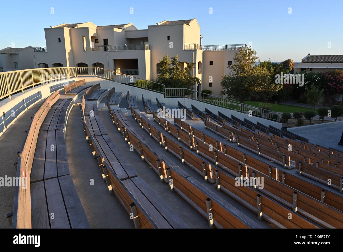 Side view on empty amphitheater in a beach holiday resort with rows of ...