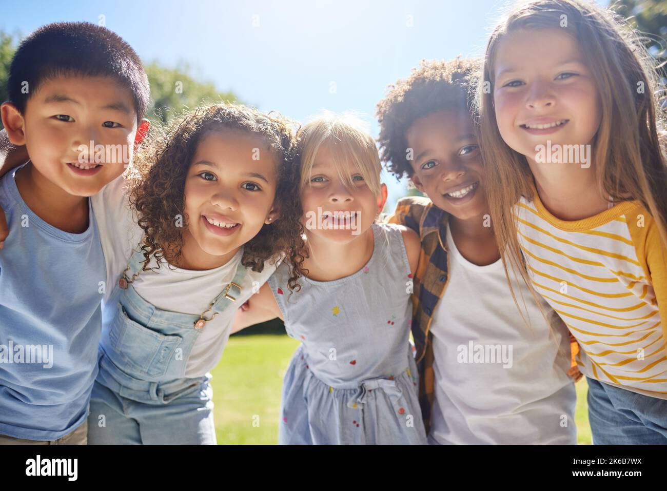 Let kids be kids. a group of elementary school children together Stock ...