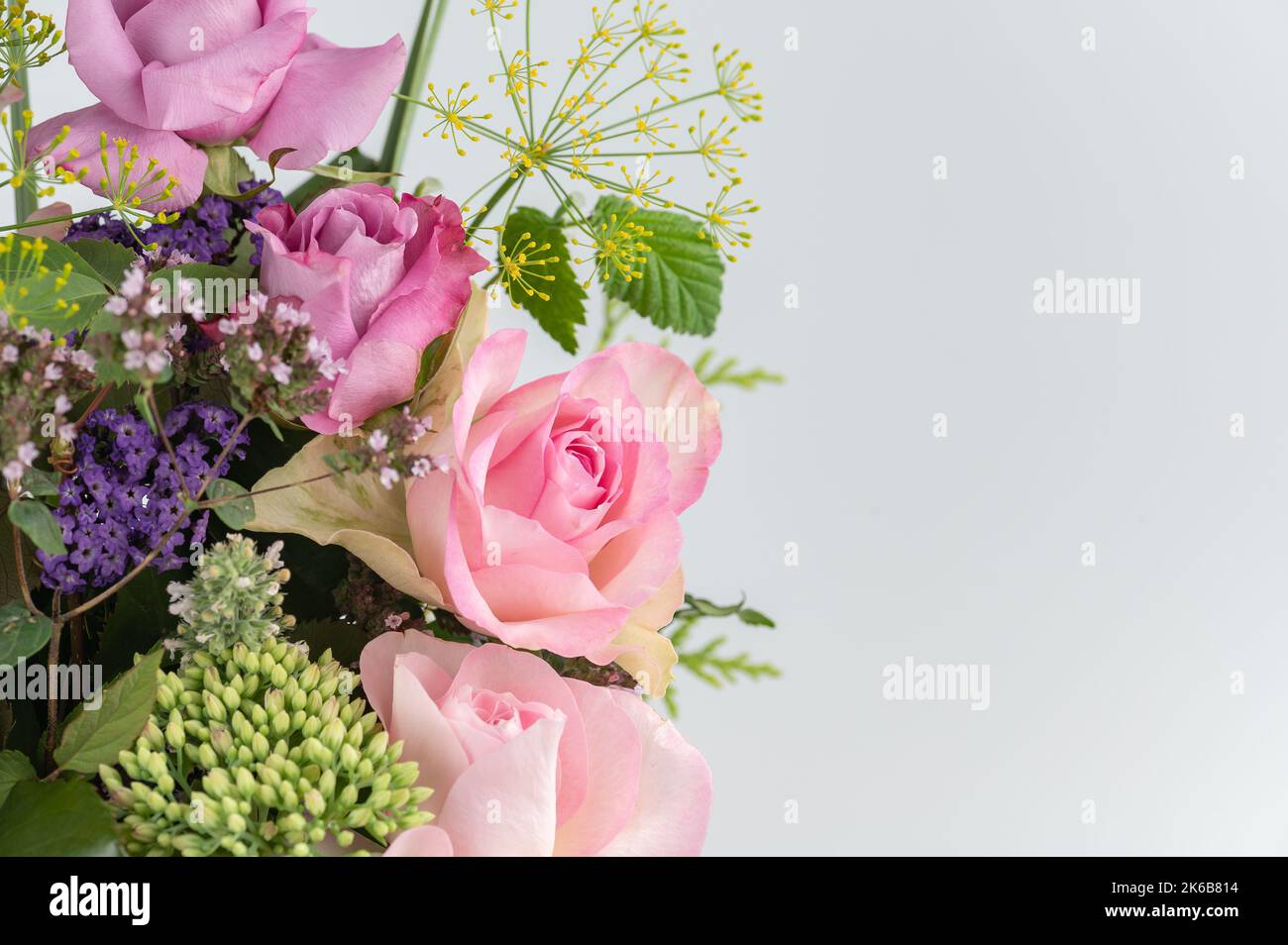 Rose flower bouquet on white background close up Stock Photo - Alamy