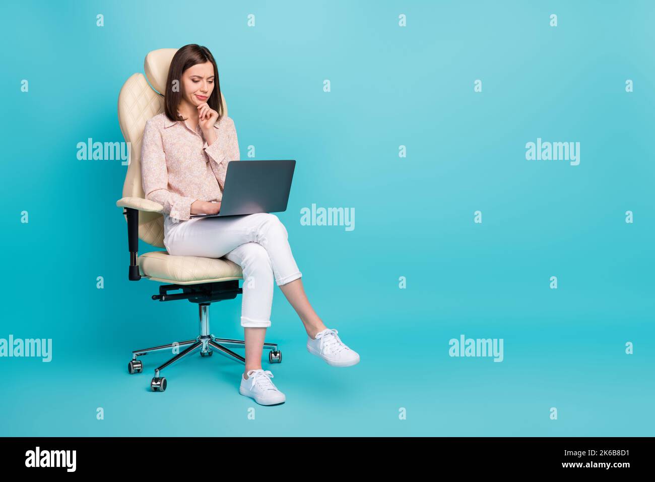 Full body length photo of business lady sitting using her laptop touch ...