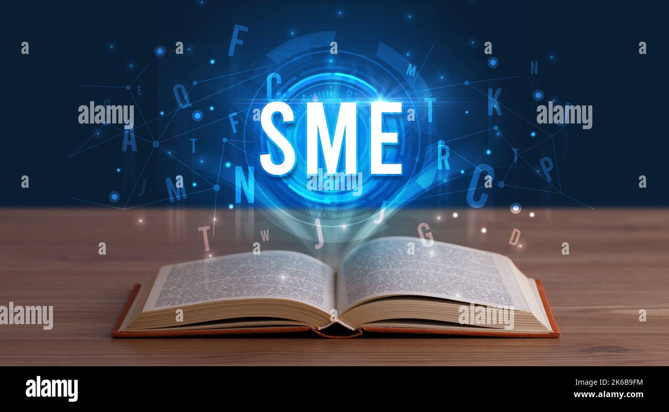 Technology abbreviation coming out from an open book Stock Photo - Alamy