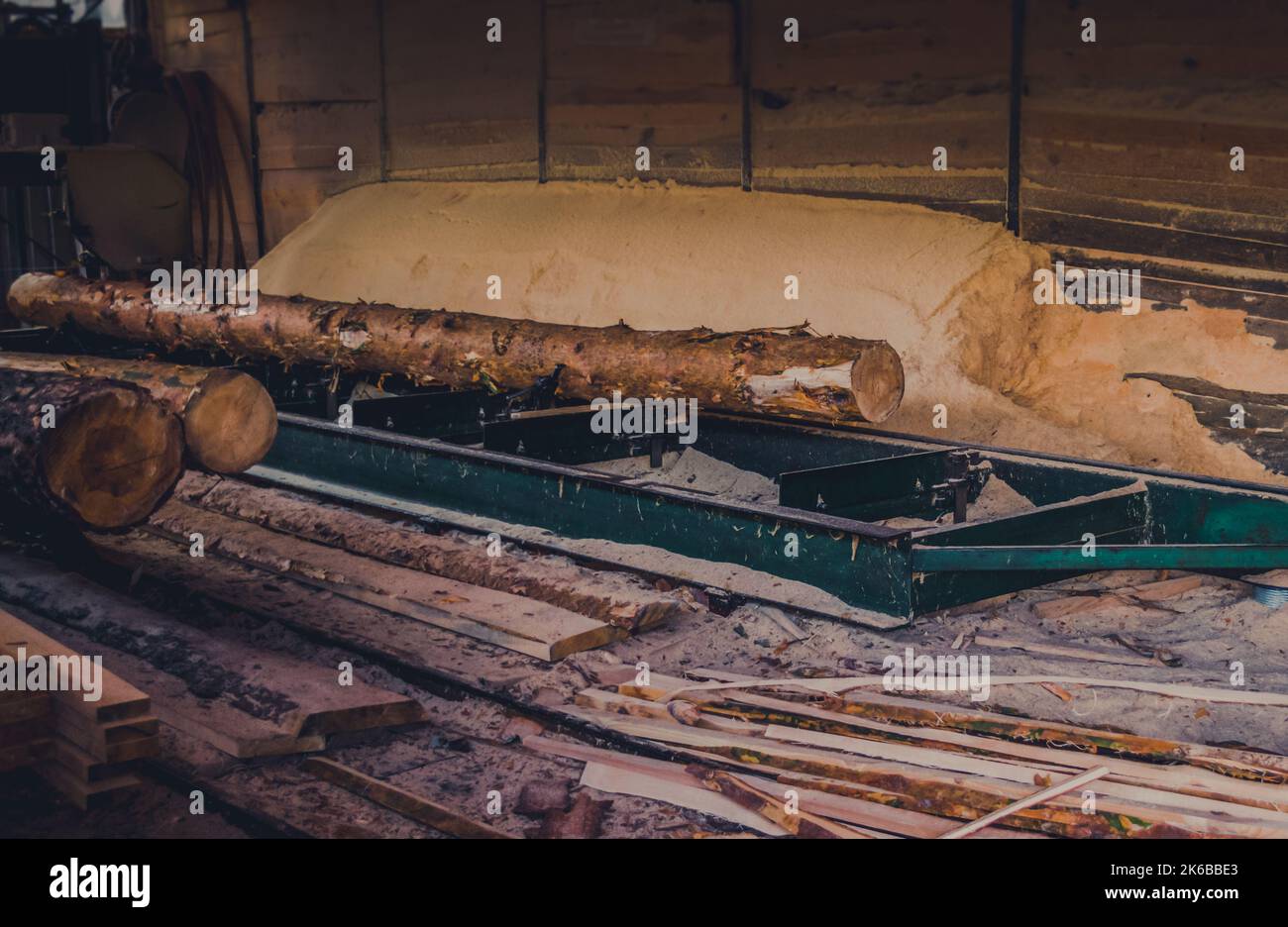 Sawmill. Process of machining logs in equipment sawmill machine saw ...