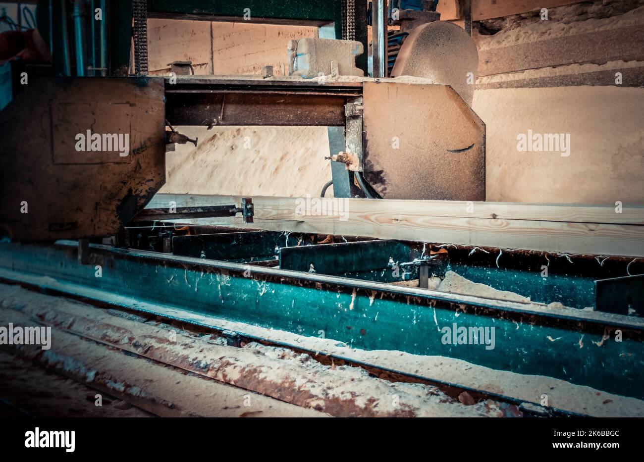Sawmill. Process of machining logs in equipment sawmill machine saw ...
