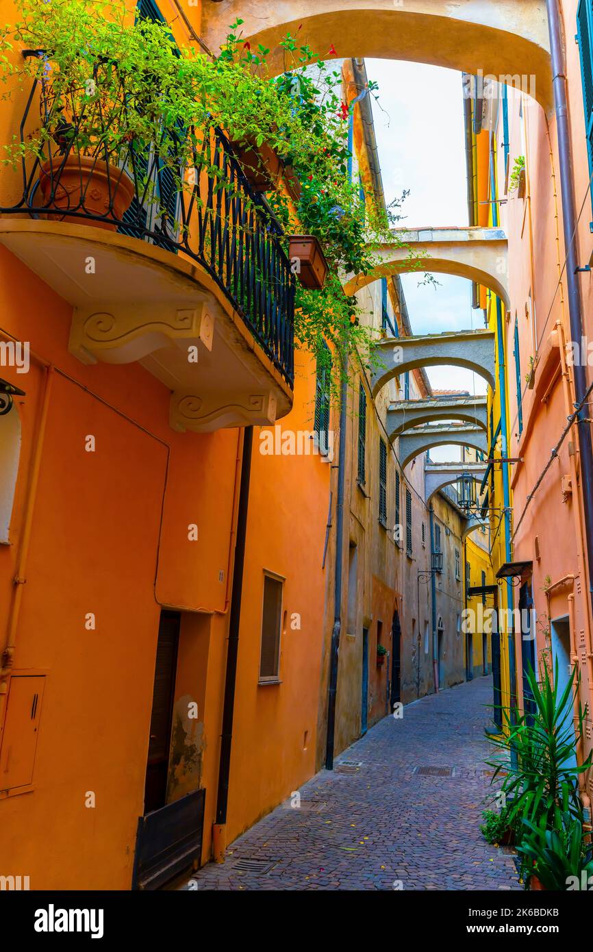 The picturesque narrow streets of Noli. Noli old town. Liguria, Italy ...