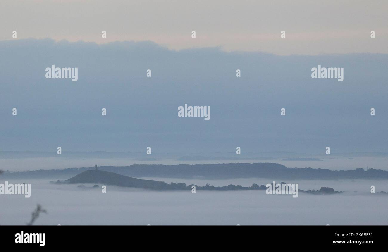 The Somerset levels are covered in morning mist and fog as seen from ...