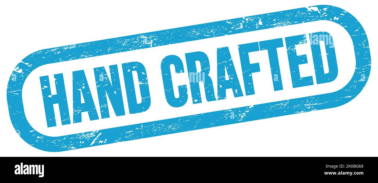 HAND CRAFTED, text on blue rectangle stamp sign Stock Photo - Alamy