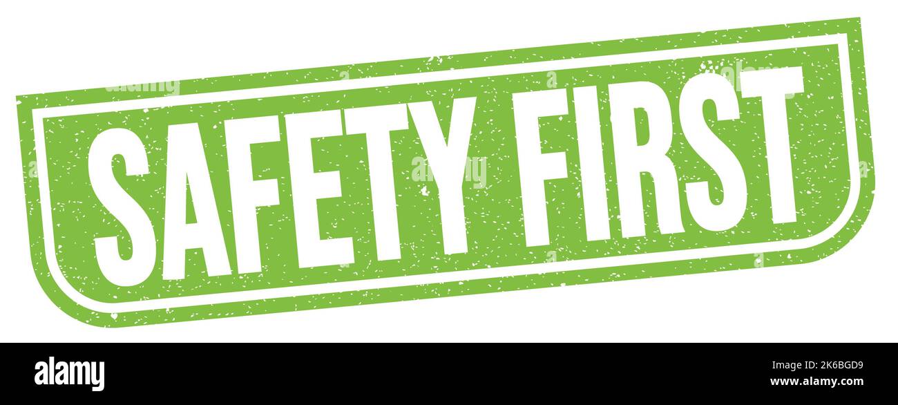 SAFETY FIRST text written on green grungy stamp sign Stock Photo - Alamy