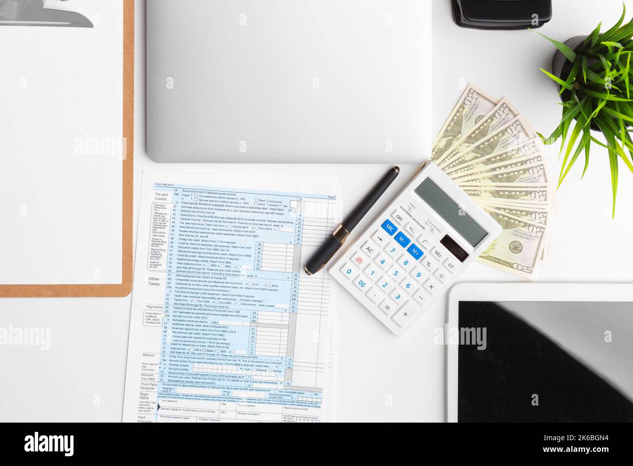paperwork in the office and laptop on the desktop Stock Photo - Alamy