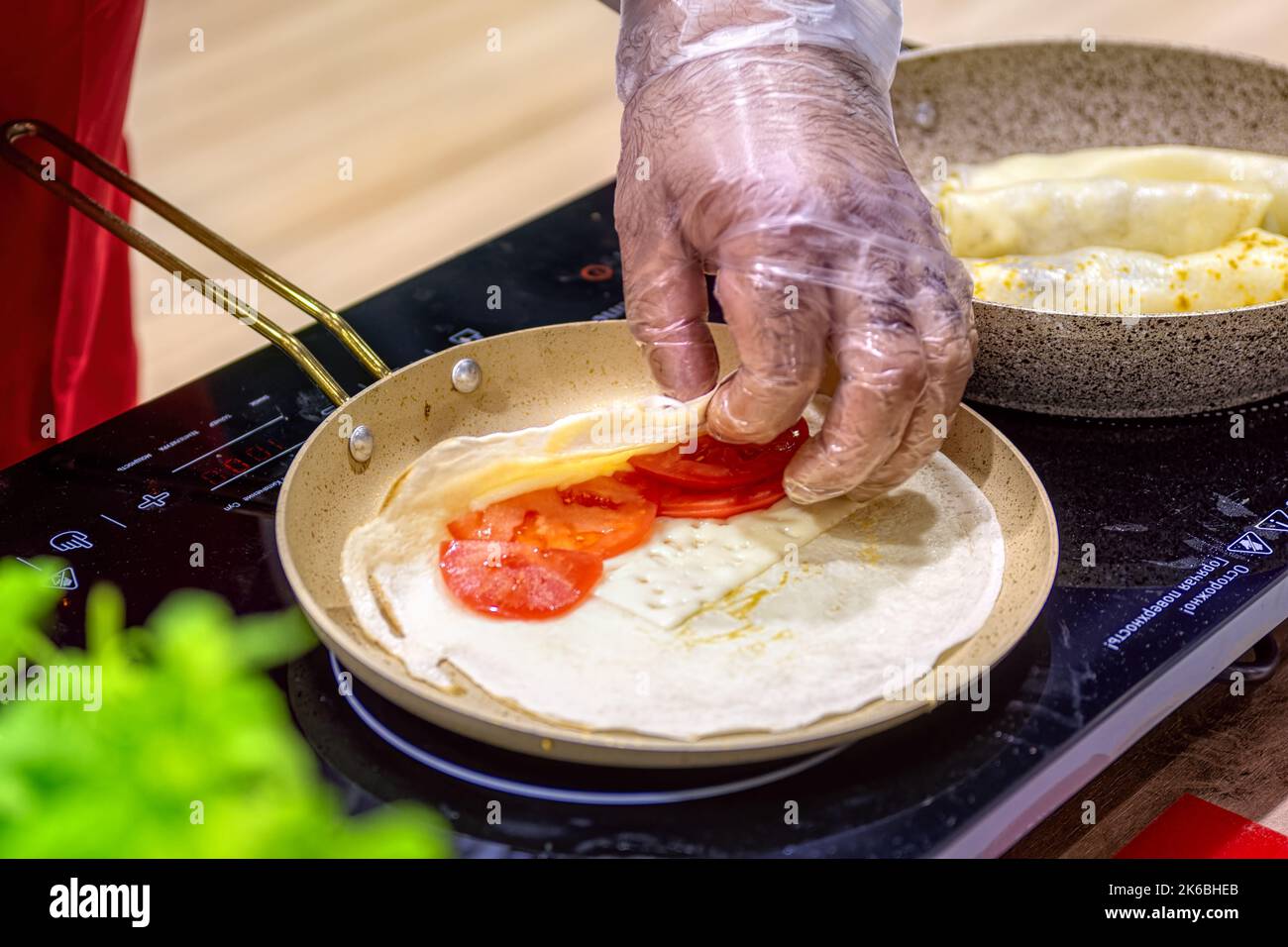 Pancakes stuffed frying in pan hi-res stock photography and images - Alamy