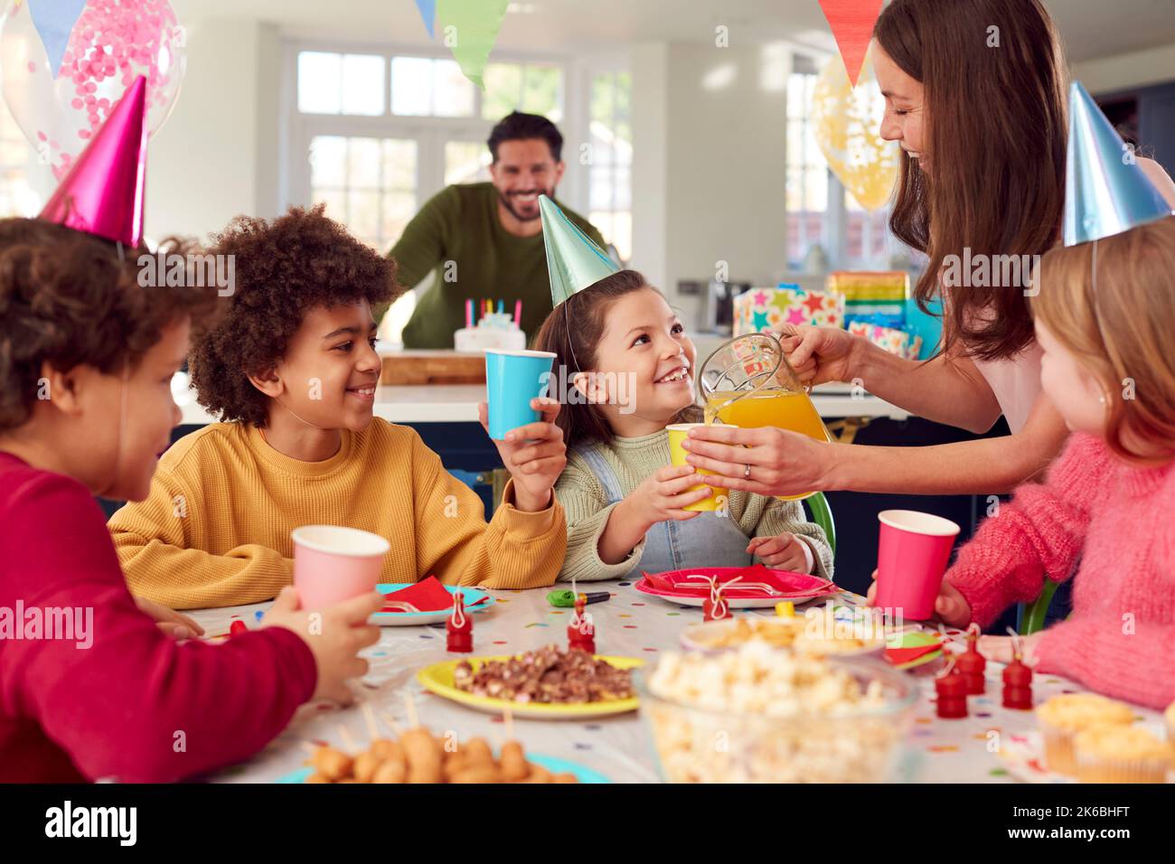 Pouring juice and child and party hi-res stock photography and images ...