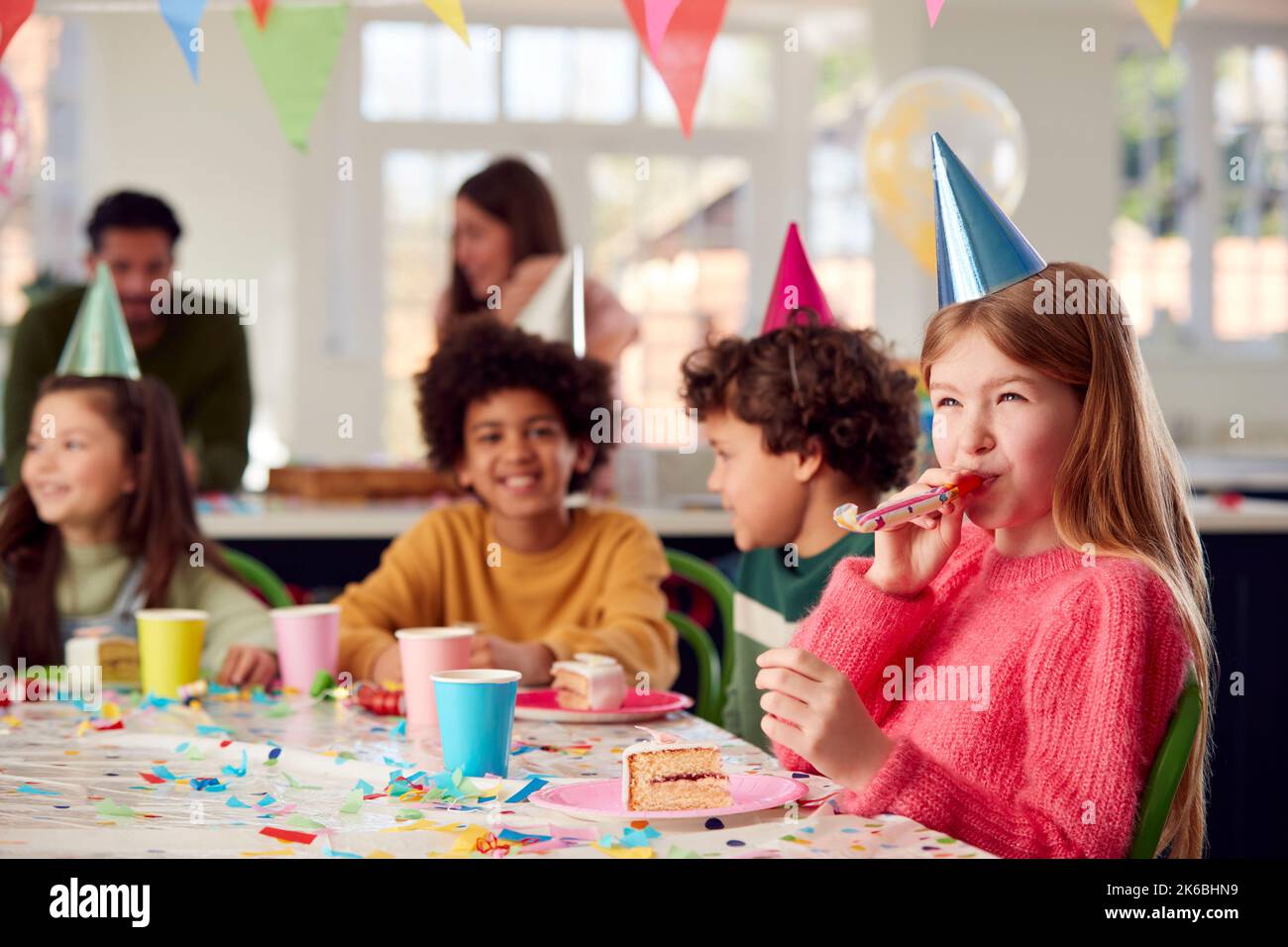 Boy laughing and looking at birthday cake hi-res stock photography and ...