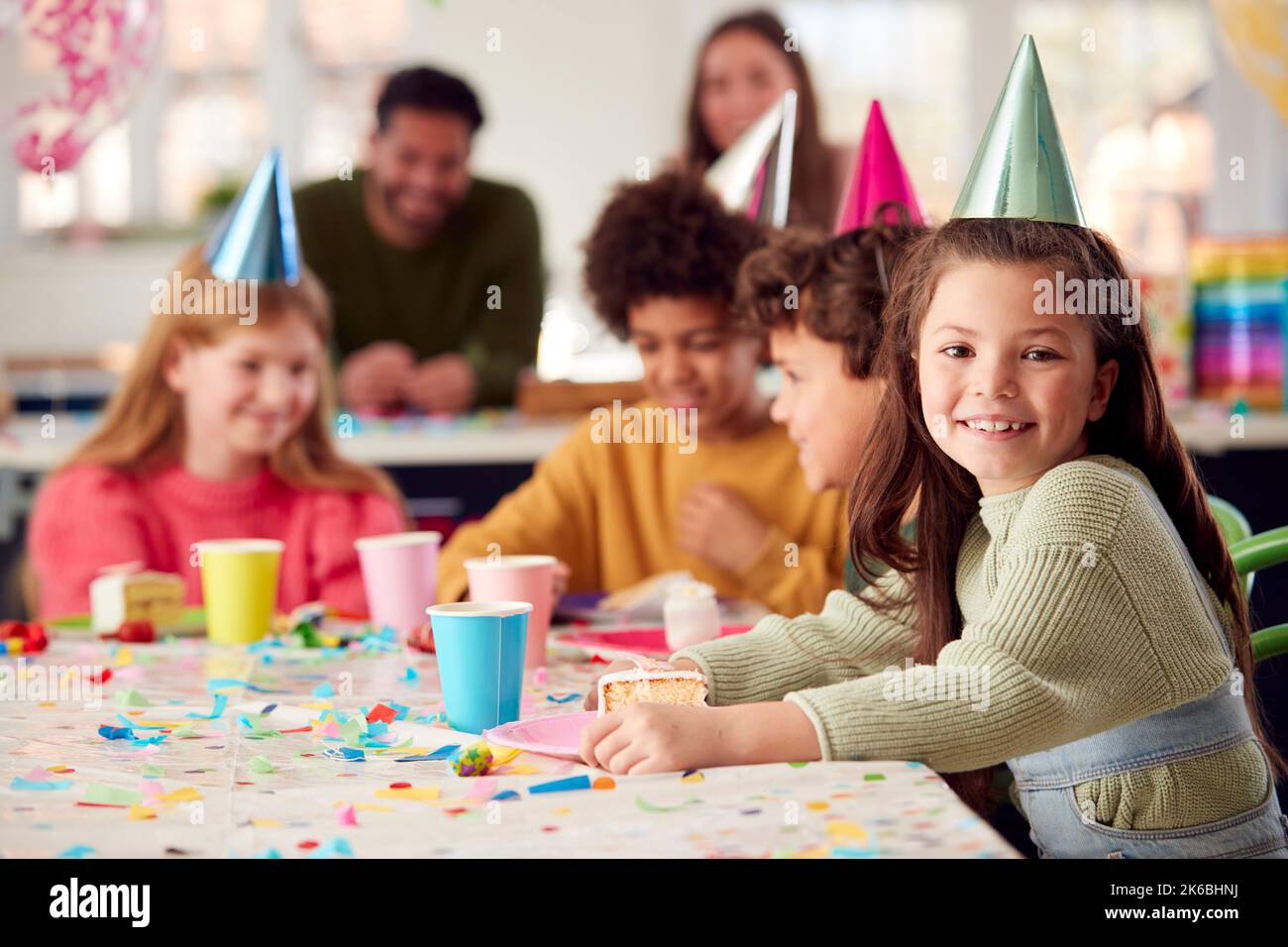 Girl eating cake african hi-res stock photography and images - Alamy