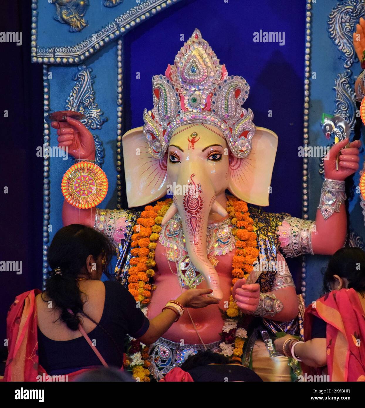 A women offering puja to lord ganesha on vijaya dashami which is the ...