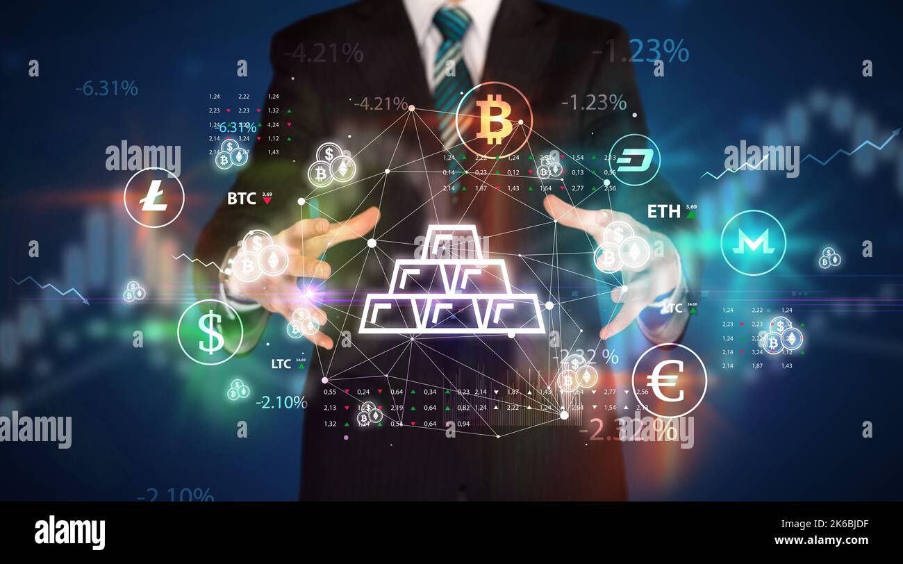 Businessman holding currency symbols concept Stock Photo - Alamy