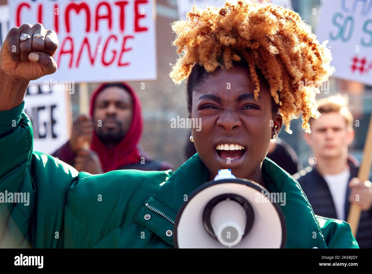 Group Of Protestors With Placards And Megaphone On Demonstration March ...
