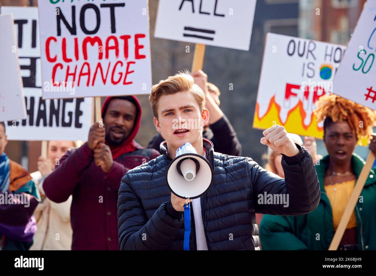 Group Of Protestors With Placards And Megaphone On Demonstration March ...