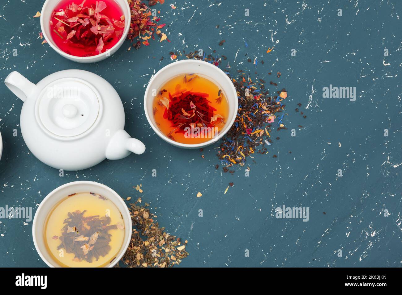 herbal tea in cups on a wooden background Stock Photo - Alamy