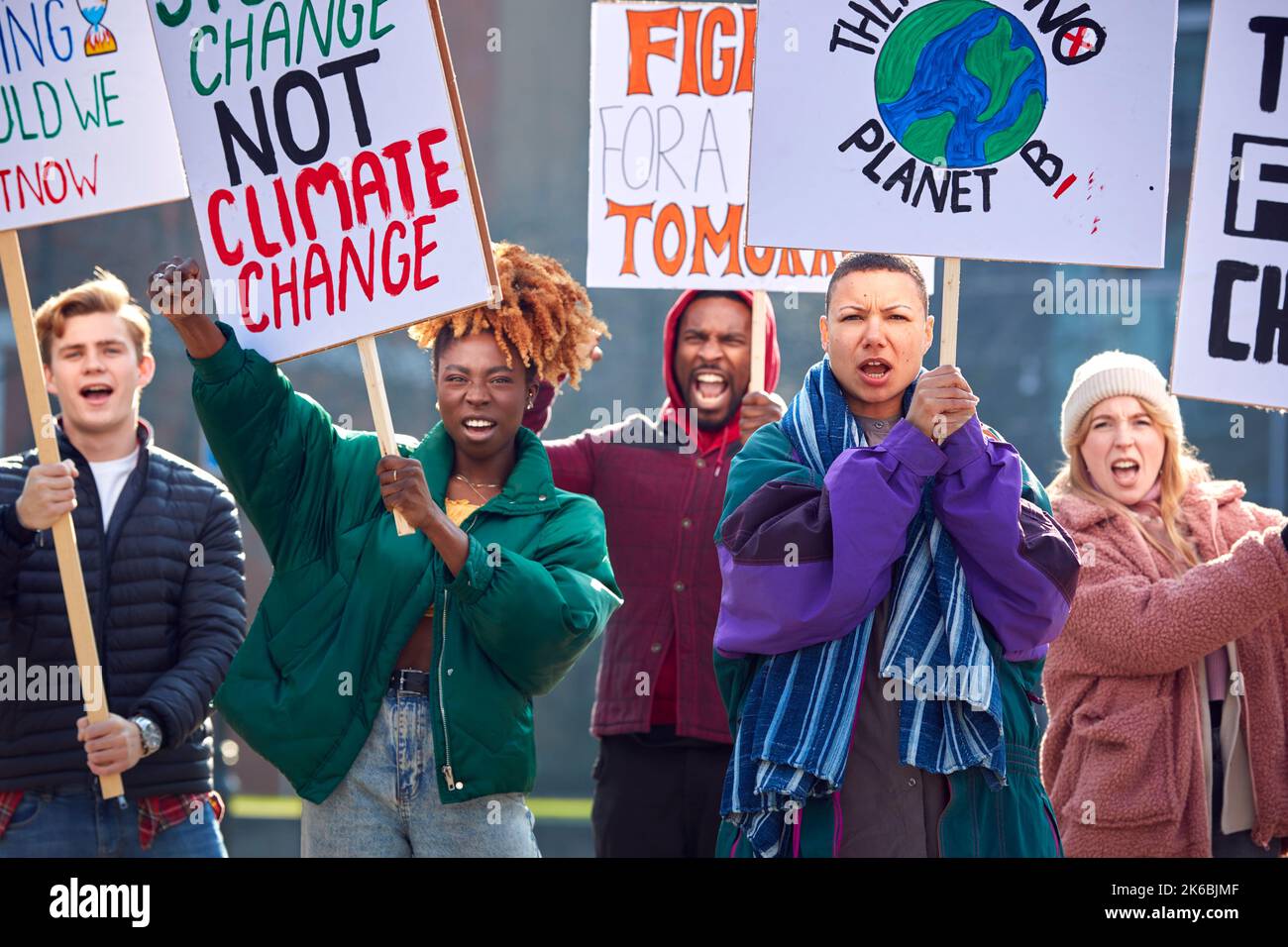 Group Of Protestors With Placards On Demonstration March Against ...