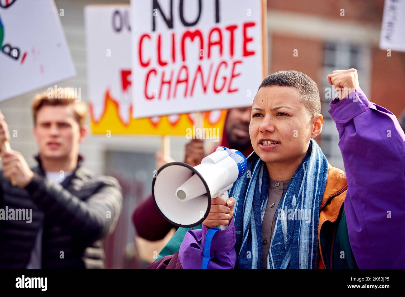 Group Of Protestors With Placards And Megaphone On Demonstration March ...