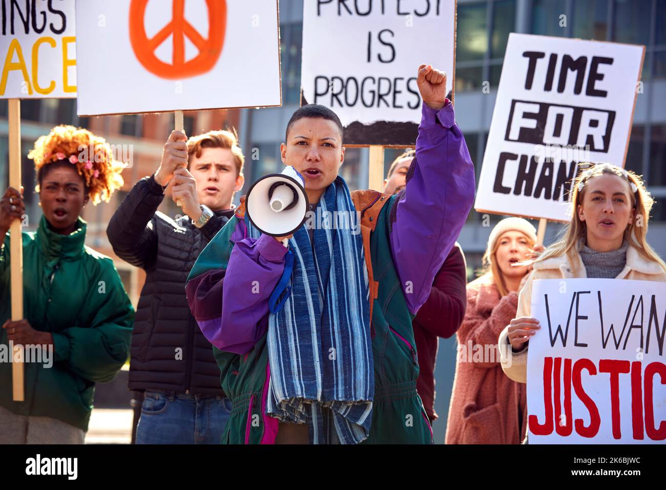 Group Of Protestors With Placards And Megaphone On Anti War ...