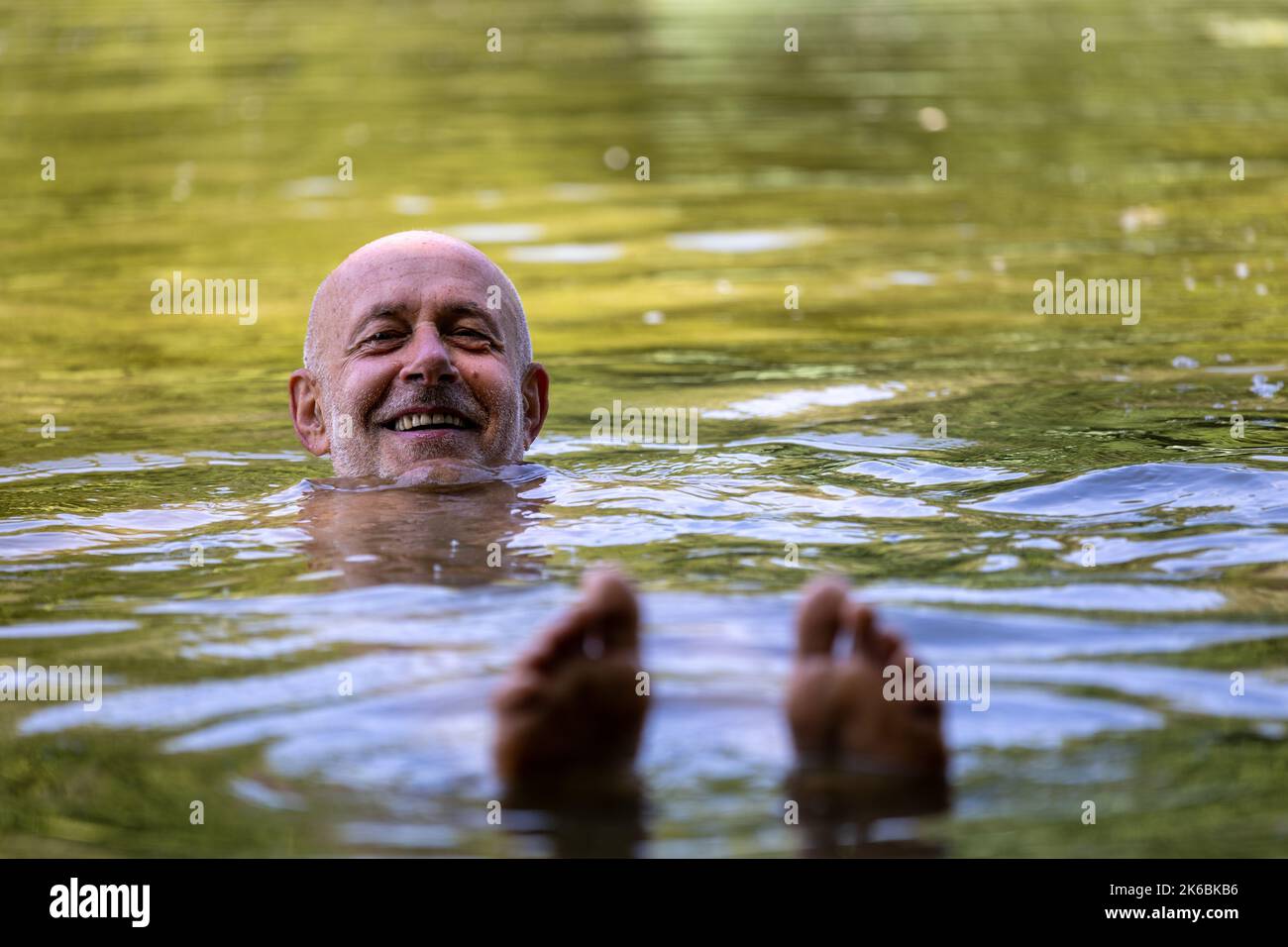 Senior man swimming hi-res stock photography and images - Alamy