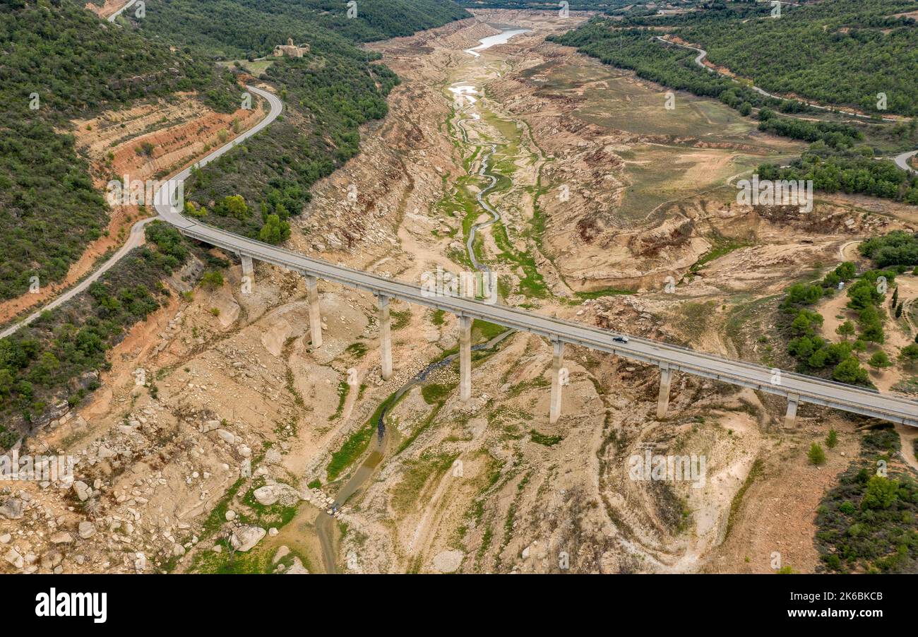 Aerial view of the almost dry Rialb reservoir during the 2022 drought ...