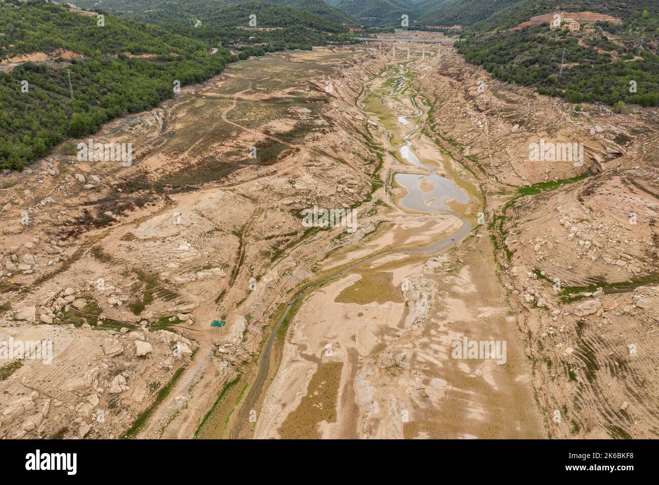 Aerial view of the almost dry Rialb reservoir during the 2022 drought ...