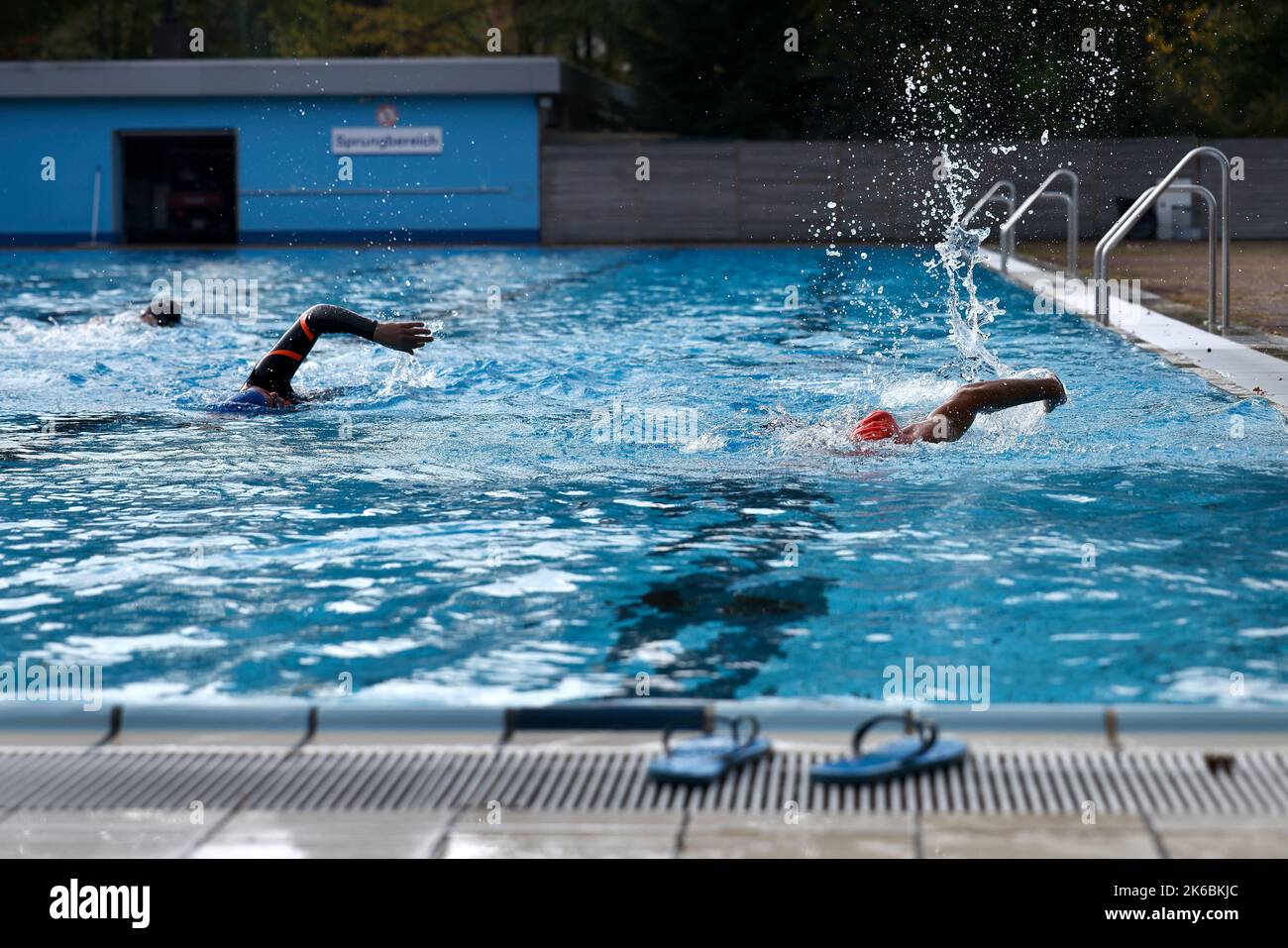 Berlin, Germany. 13th Oct, 2022. Bathers swim laps in a pool at ...
