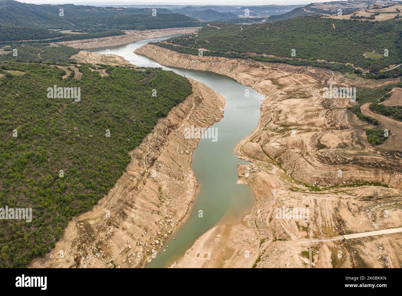 Aerial view of the almost dry Rialb reservoir during the 2022 drought ...