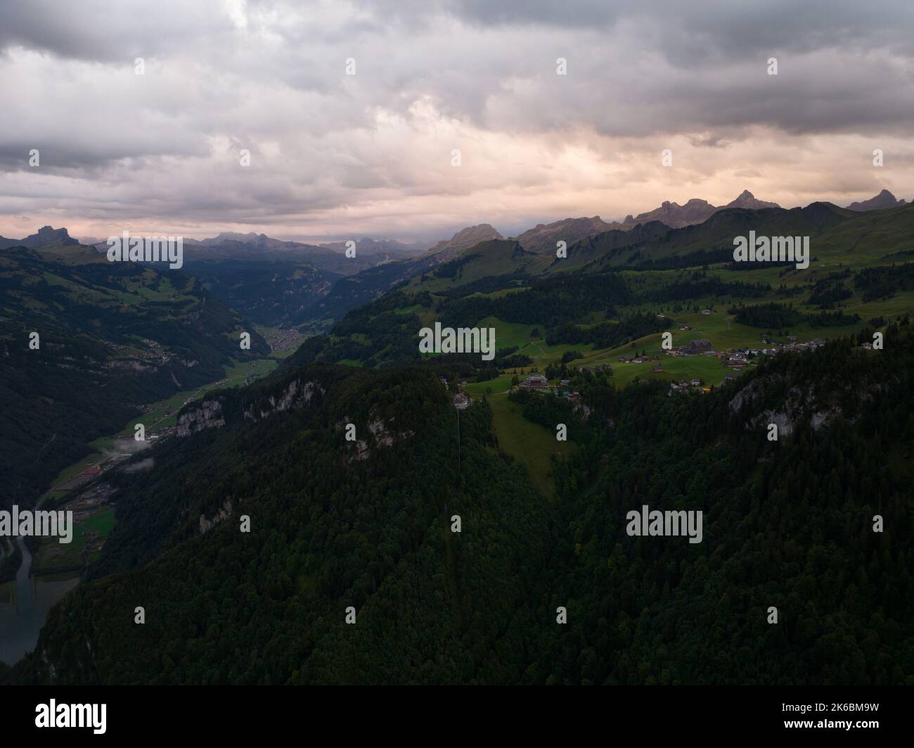 Swiss mountain village Stoos at sunset aerial drone overview in canton ...