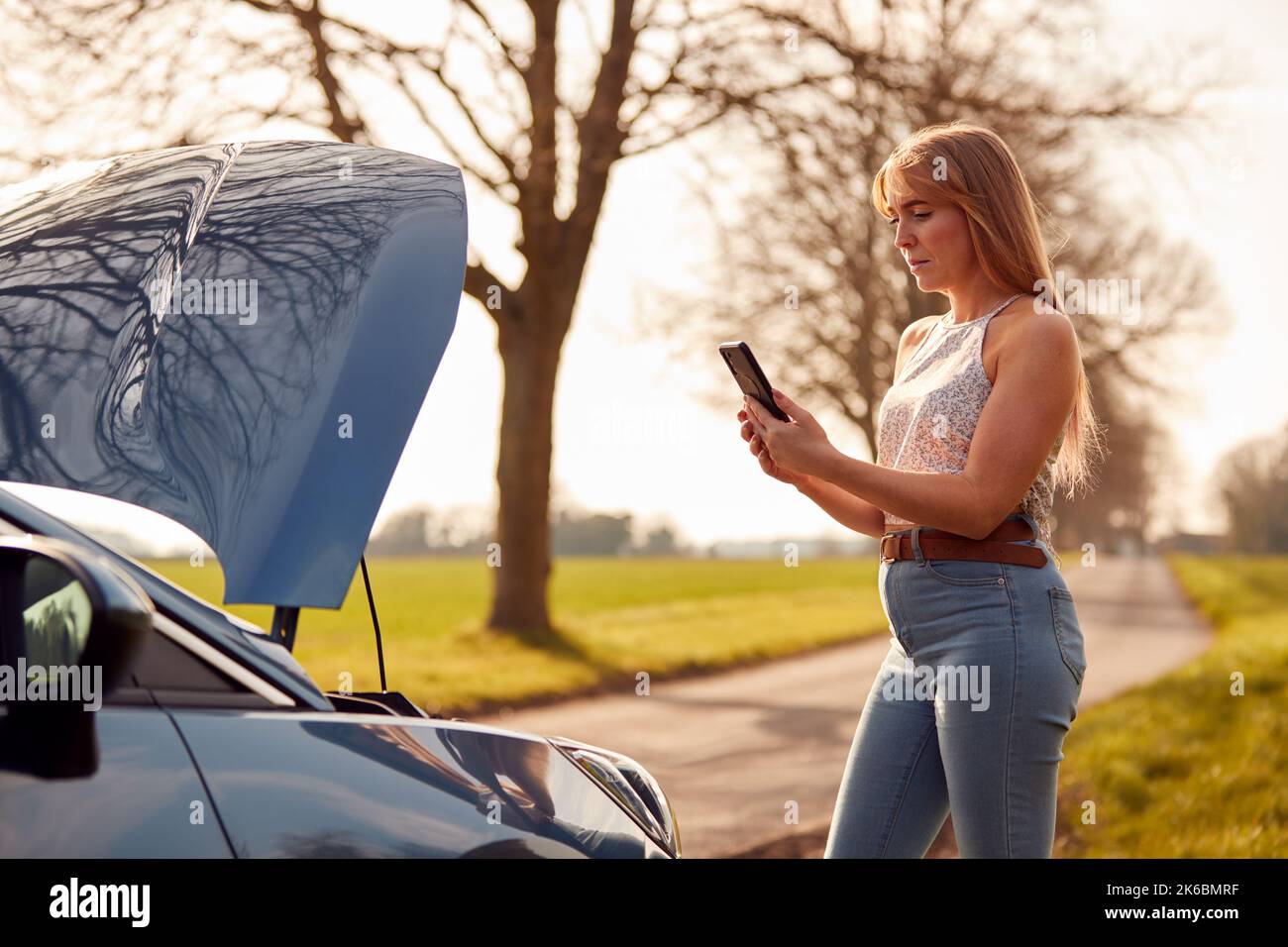 Woman calling help car hi-res stock photography and images - Alamy