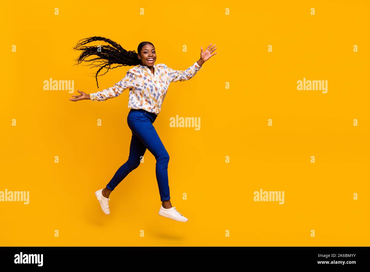 Full length body size view of attractive cheerful girl jumping walking ...